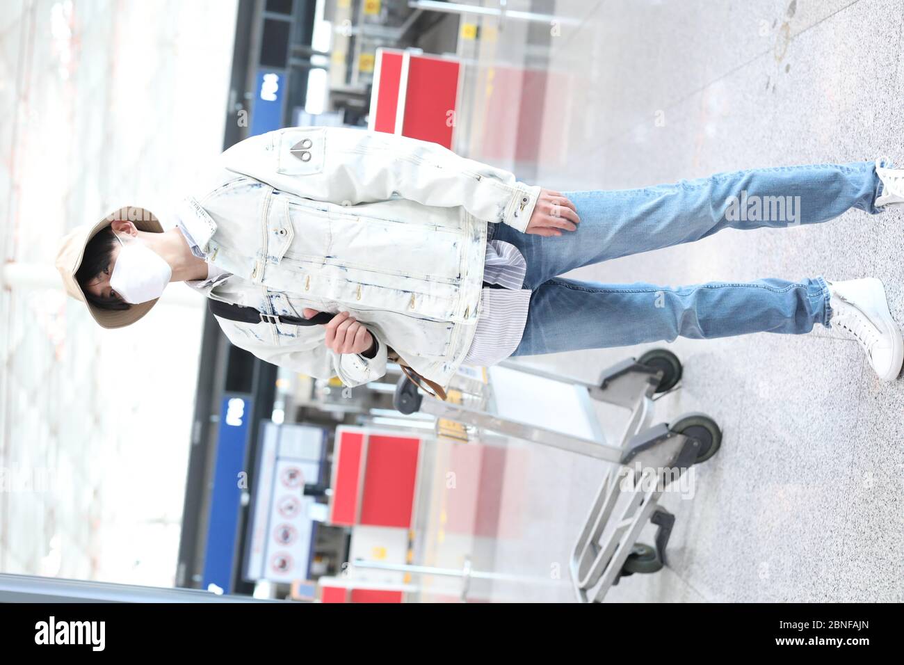 Chinese actor Zhang Yunlong arrives at a Beijing airport before ...