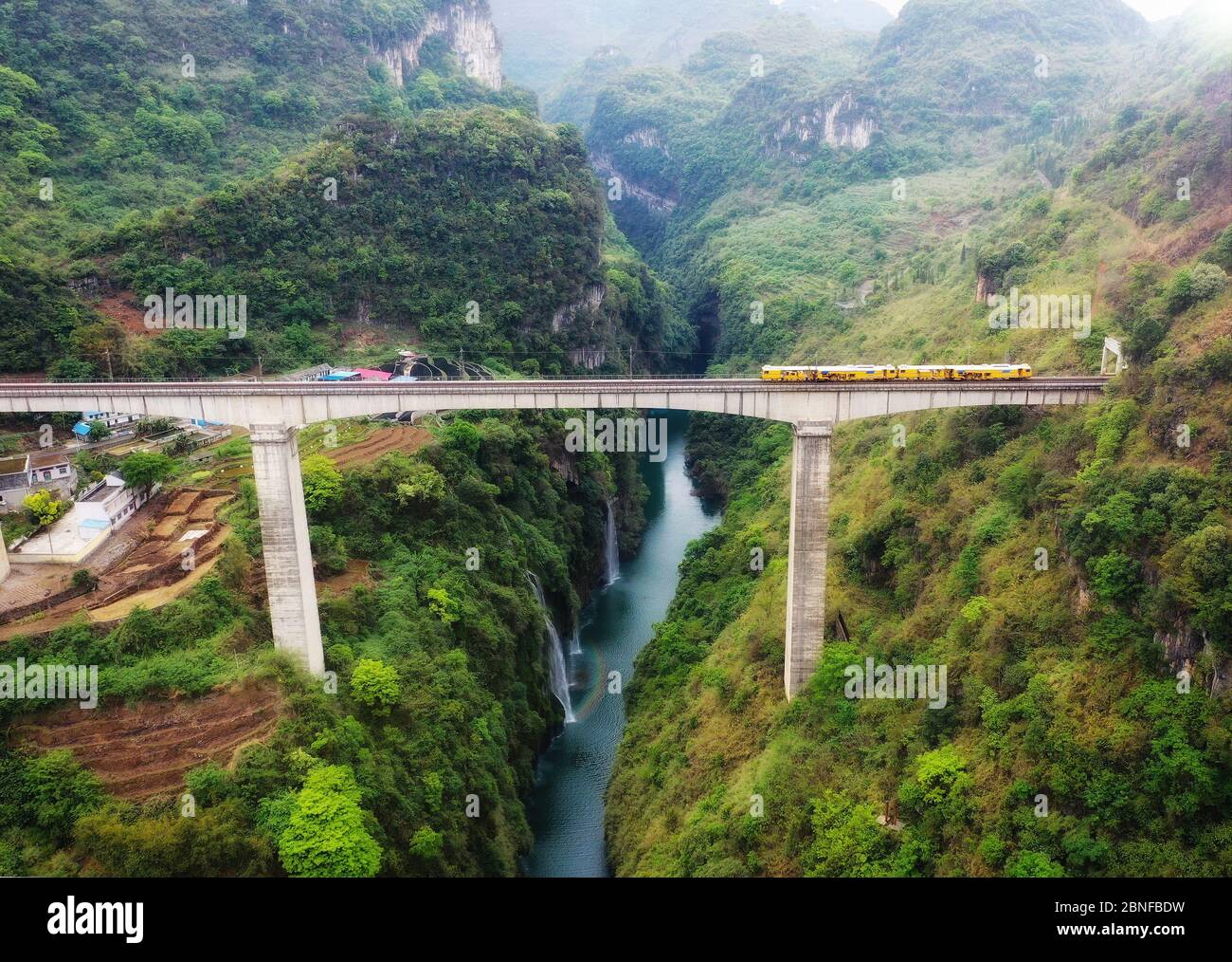 Aerial photo shows the Qingshui River suspension bridge along Nankun ...
