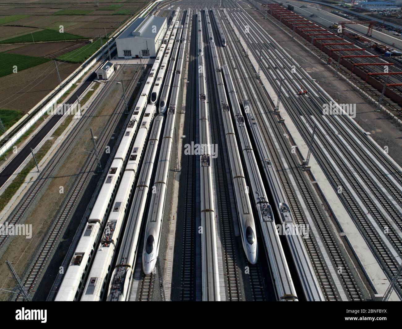 An aerial view of high-speed train parking at a railway station, ready ...