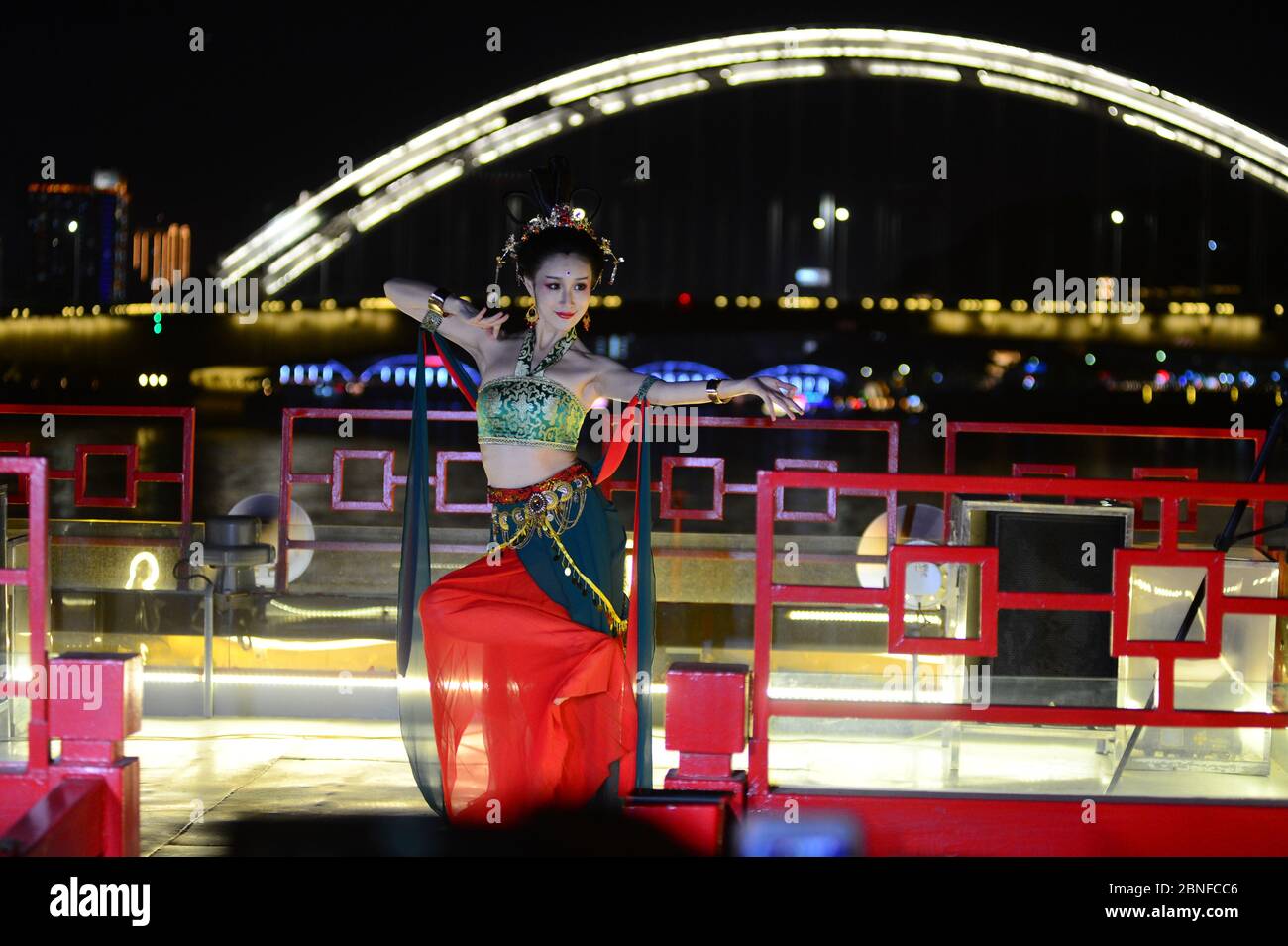 A performer plays Dunhuang Flying Apsaras Dance, which drew inspiration ...