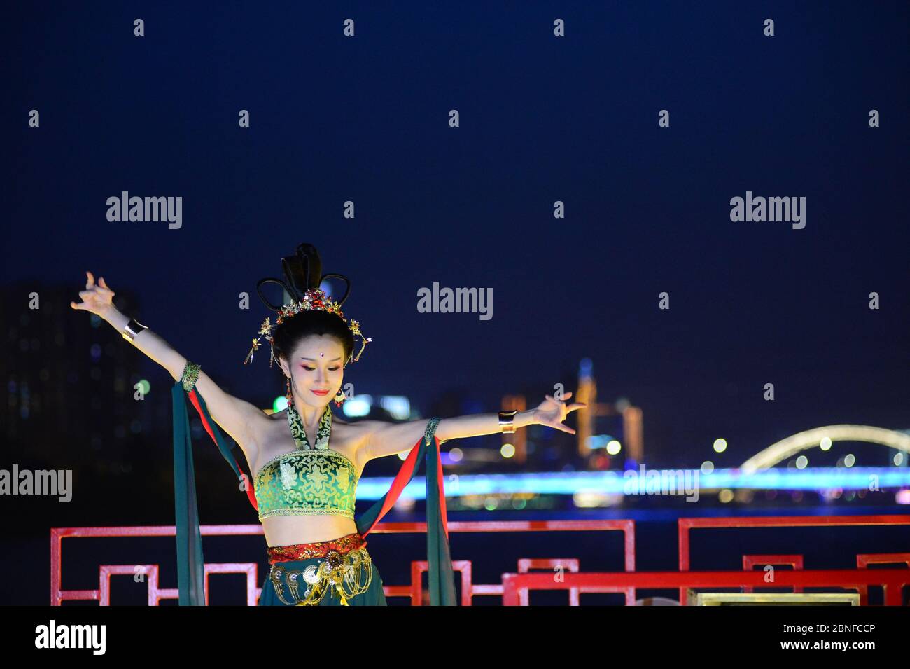 A performer plays Dunhuang Flying Apsaras Dance, which drew inspiration ...