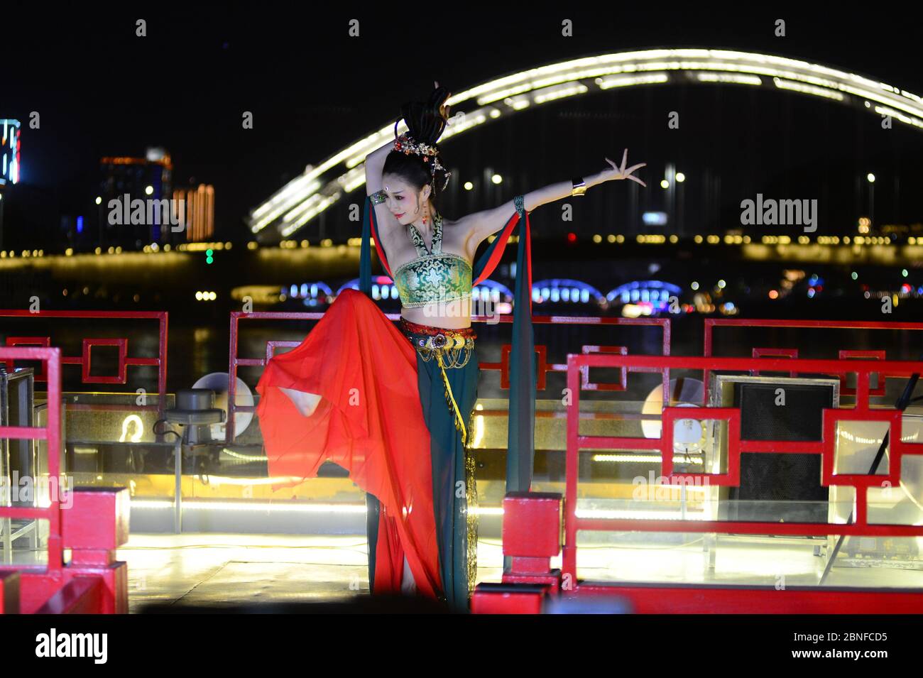 A performer plays Dunhuang Flying Apsaras Dance, which drew inspiration ...