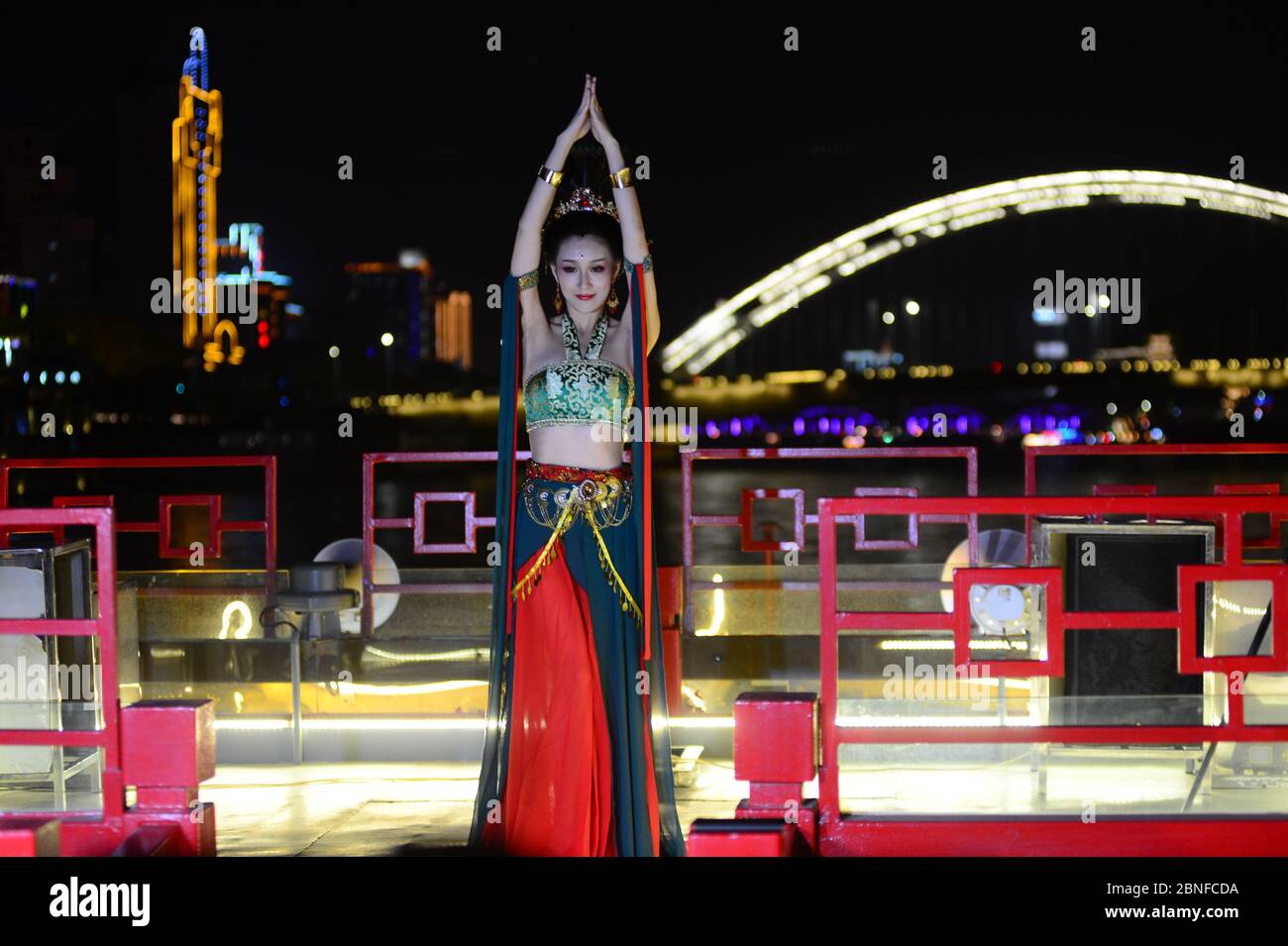 A performer plays Dunhuang Flying Apsaras Dance, which drew inspiration ...