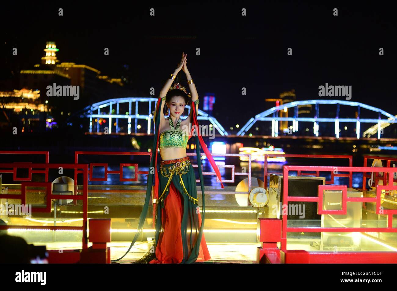 A performer plays Dunhuang Flying Apsaras Dance, which drew inspiration ...