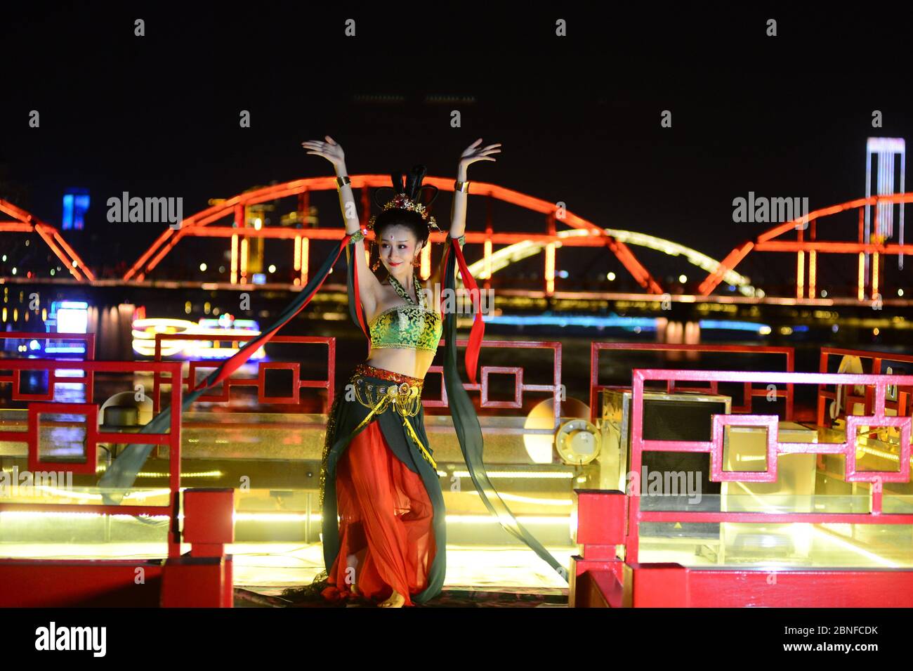 A performer plays Dunhuang Flying Apsaras Dance, which drew inspiration ...