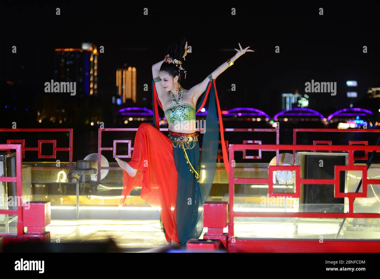A performer plays Dunhuang Flying Apsaras Dance, which drew inspiration ...