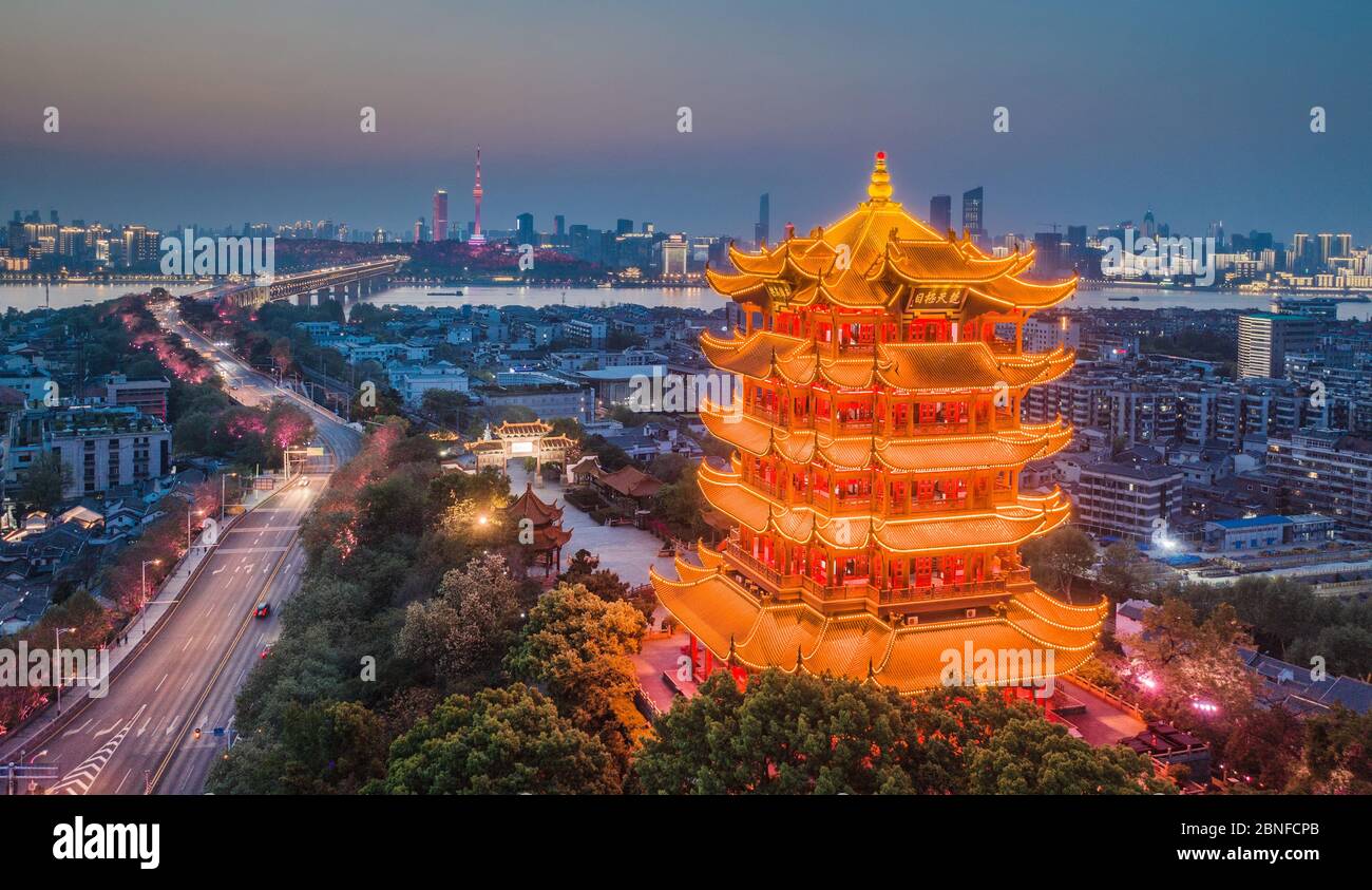An aerial view of traditional Chinese tower and local tourist ...