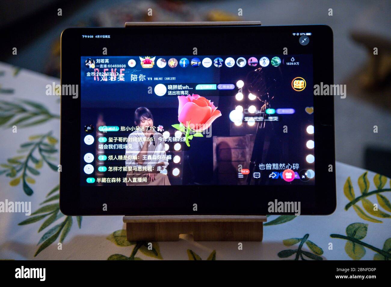 In this unlocated photo, a fan watches a livestream concert of Chinese ...