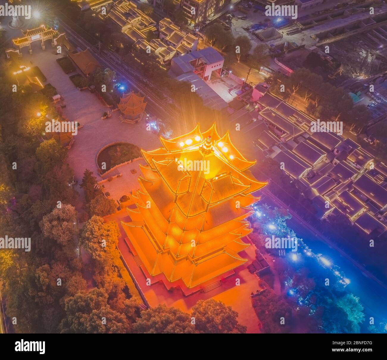 An aerial view of traditional Chinese tower and local tourist ...