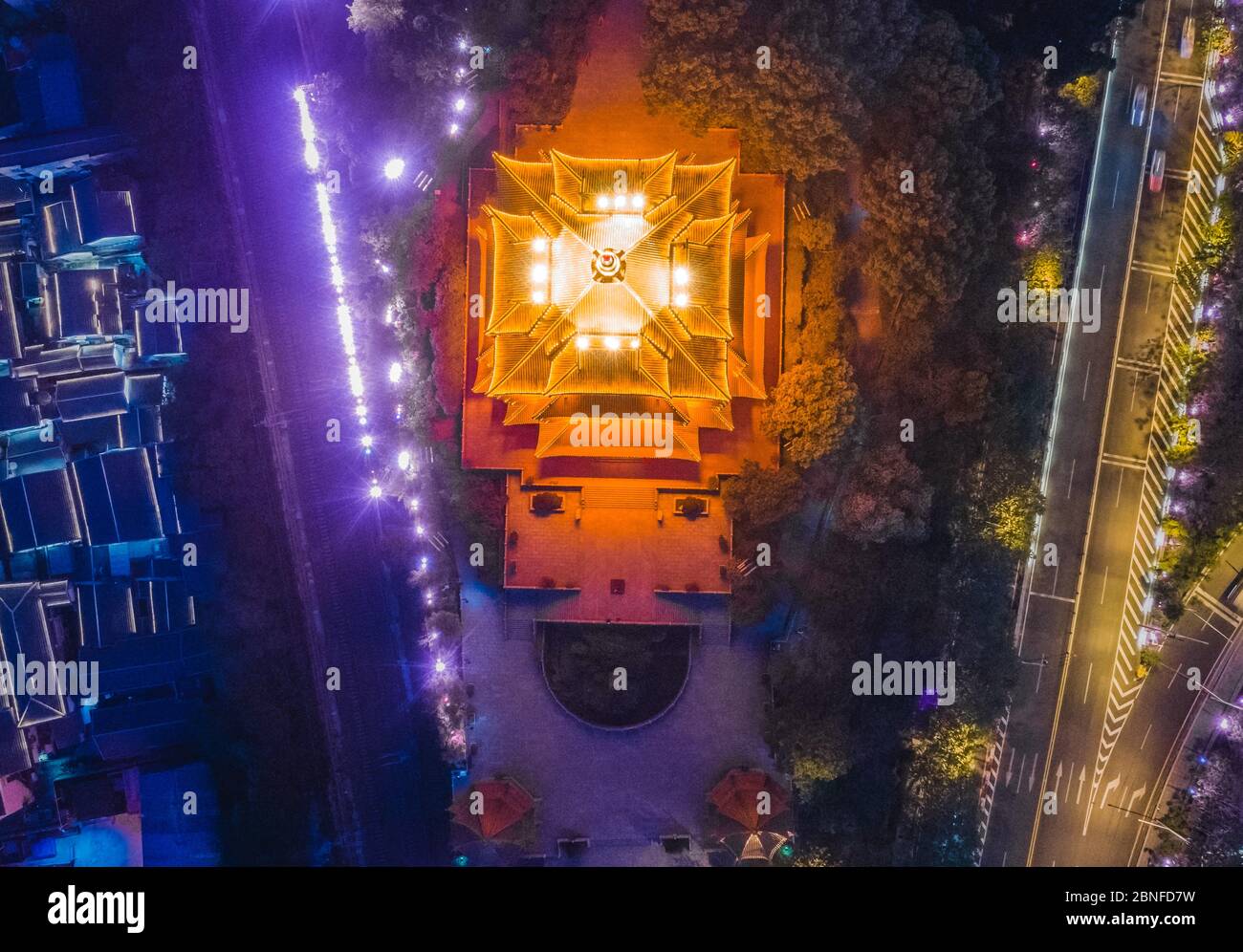 An aerial view of traditional Chinese tower and local tourist ...