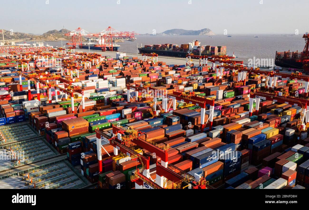 An aerial view of containers piled up at Yangshan Port, a deep water ...