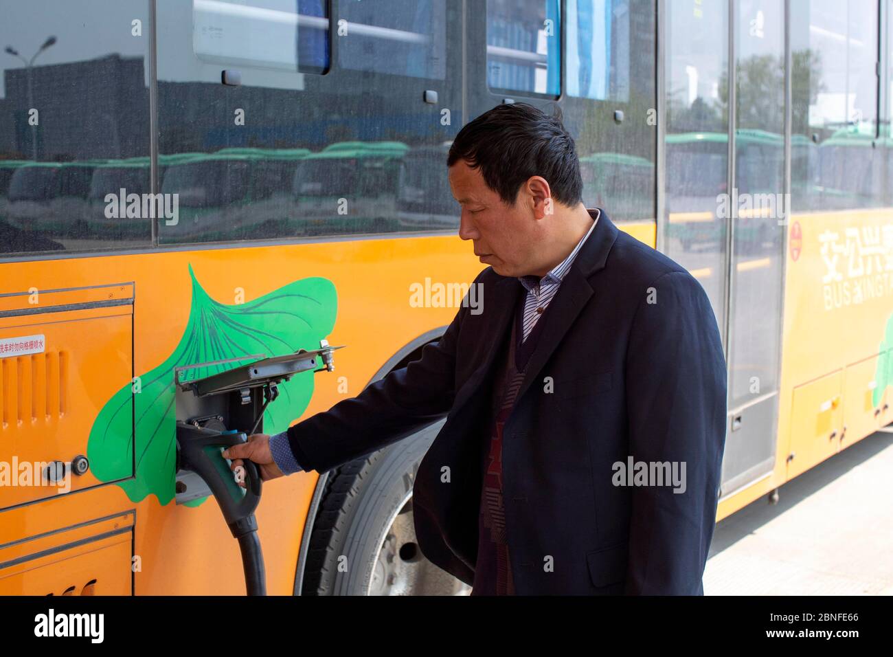 Bus driver charging electric bus hi-res stock photography and images ...