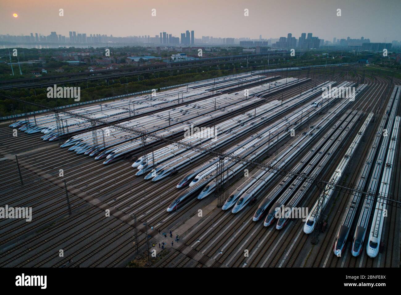 Aerial view of Hundreds of high-speed trains standing in line at Wuhan ...