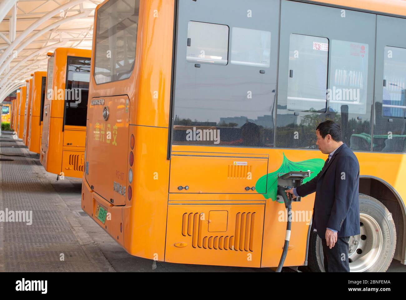 Bus driver charging electric bus hi-res stock photography and images ...