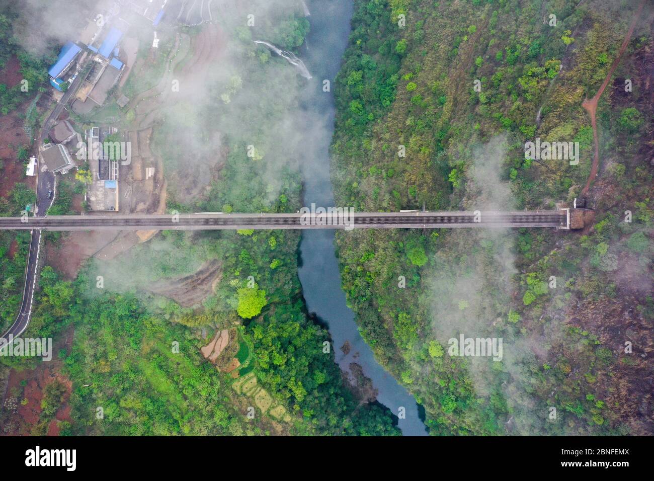 Aerial photo shows the Qingshui River suspension bridge along Nankun ...