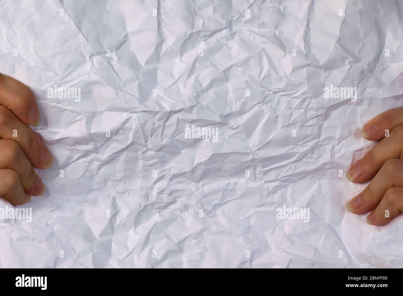 Female hands crumpling paper document hi-res stock photography and ...