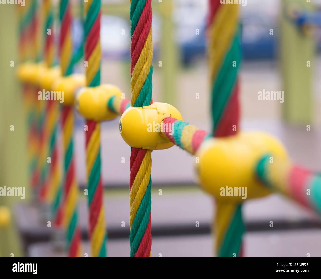 Colored ropes in the playground Stock Photo - Alamy