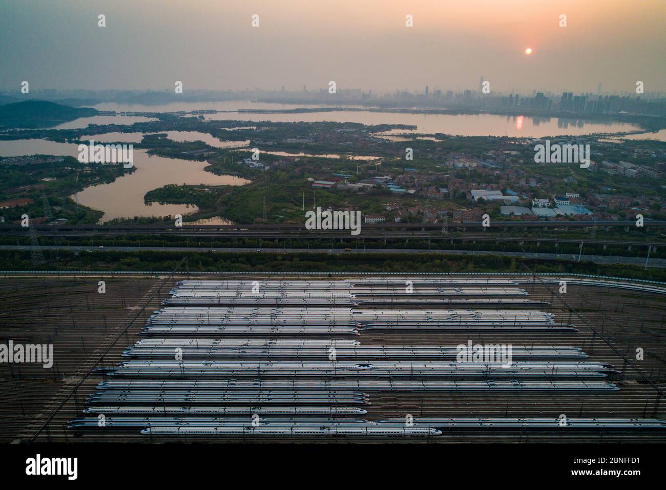 Aerial view of Hundreds of high-speed trains standing in line at Wuhan ...