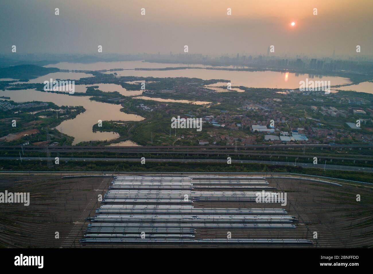 Aerial view of Hundreds of high-speed trains standing in line at Wuhan ...