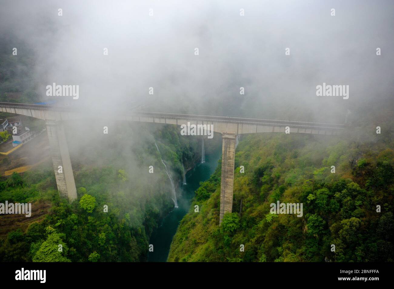 Aerial photo shows the Qingshui River suspension bridge along Nankun ...