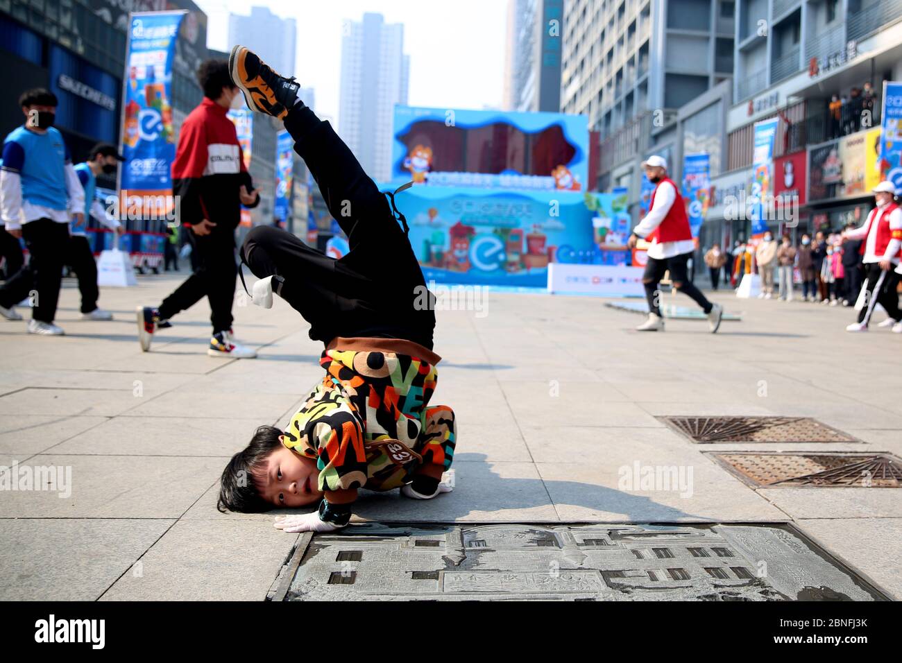 Performers dance and show for the visitors during the promotional event ...
