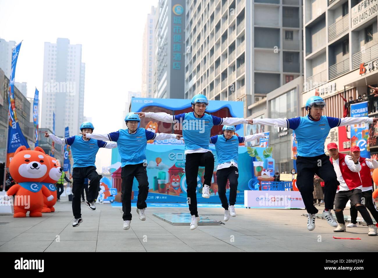 Performers dance and show for the visitors during the promotional event ...