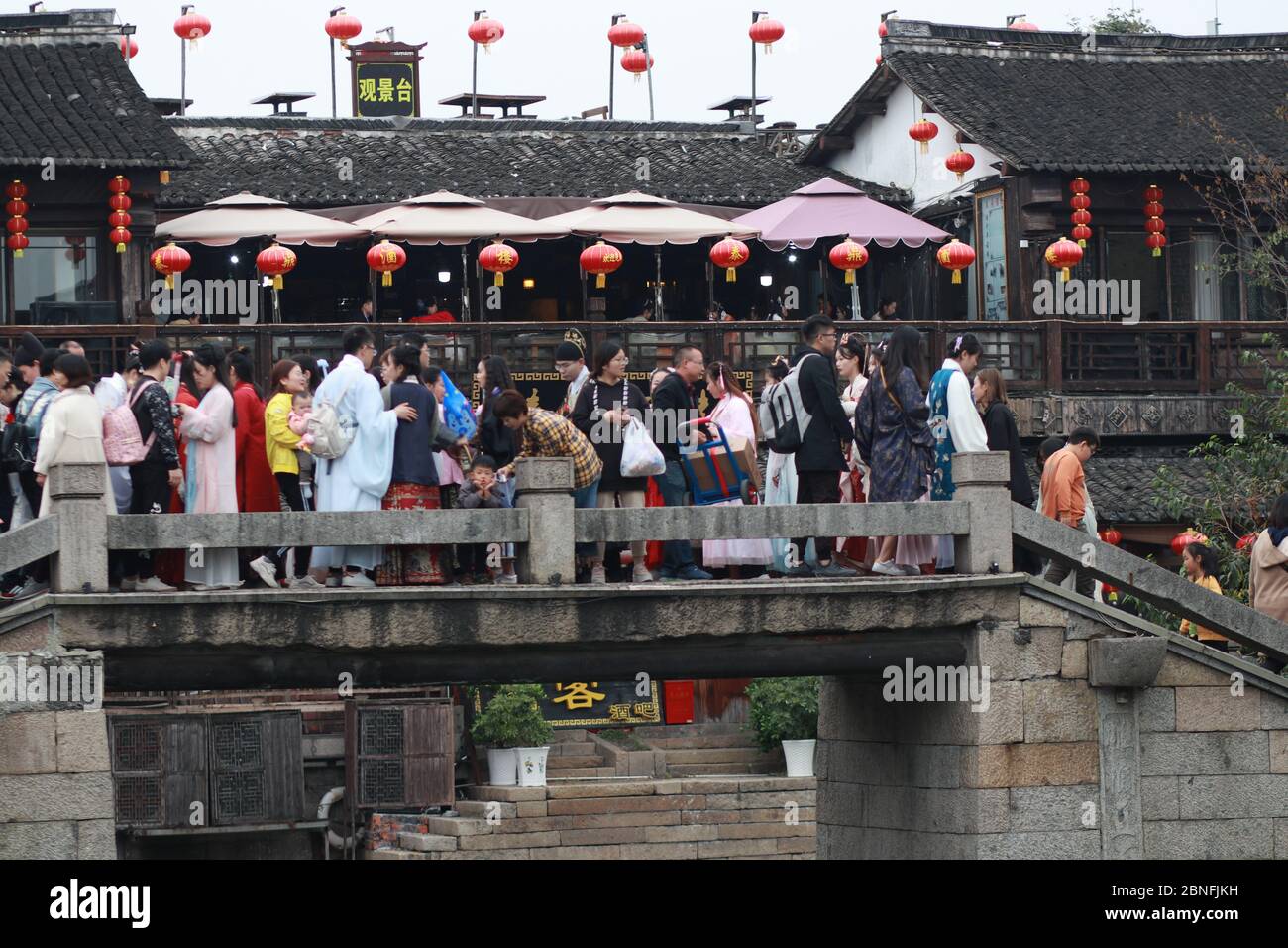 People dressed up in traditional Chinese clothing participate in ...