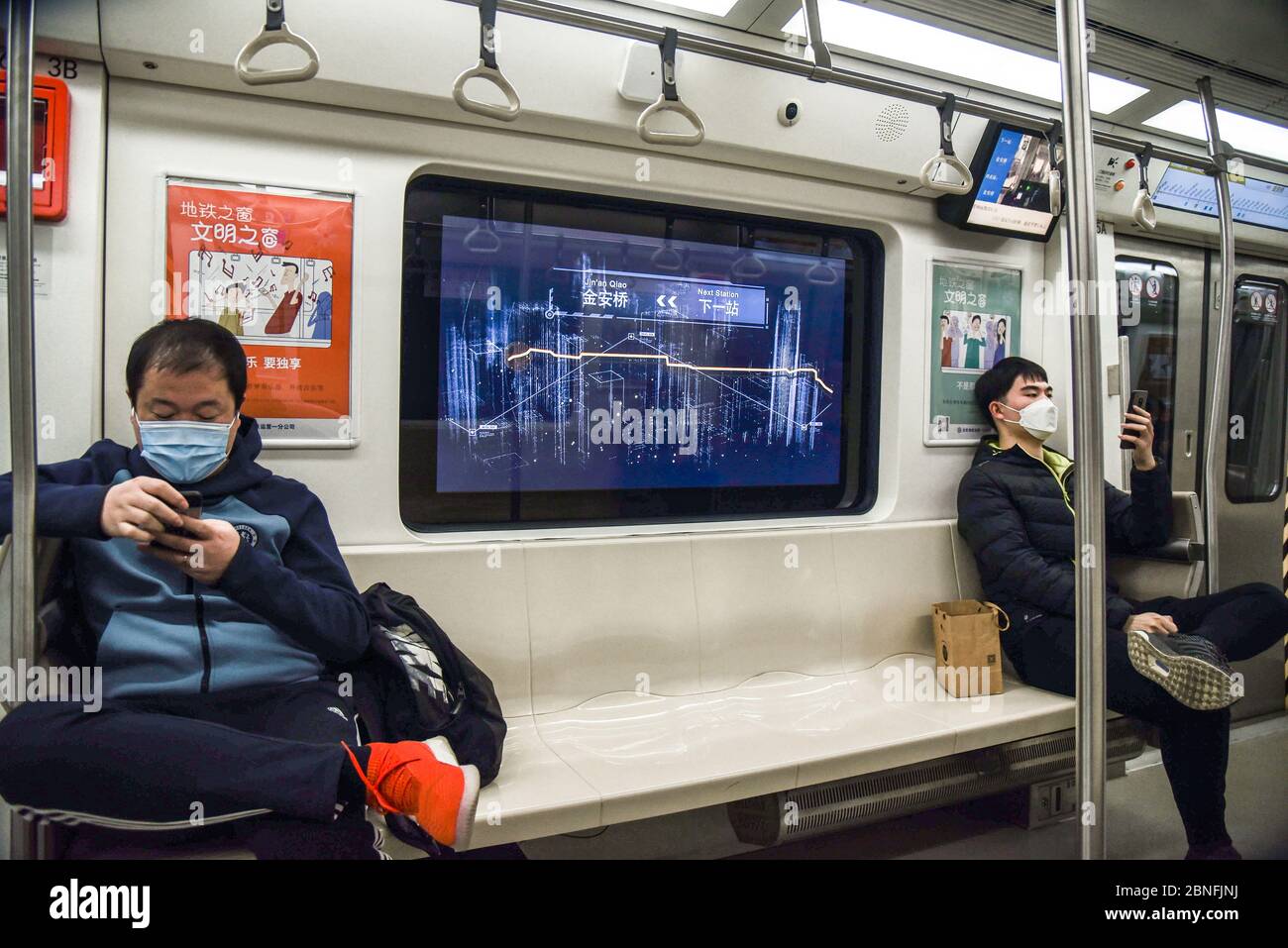A window at a train of line 6 of Beijing metro system becomes a digital ...