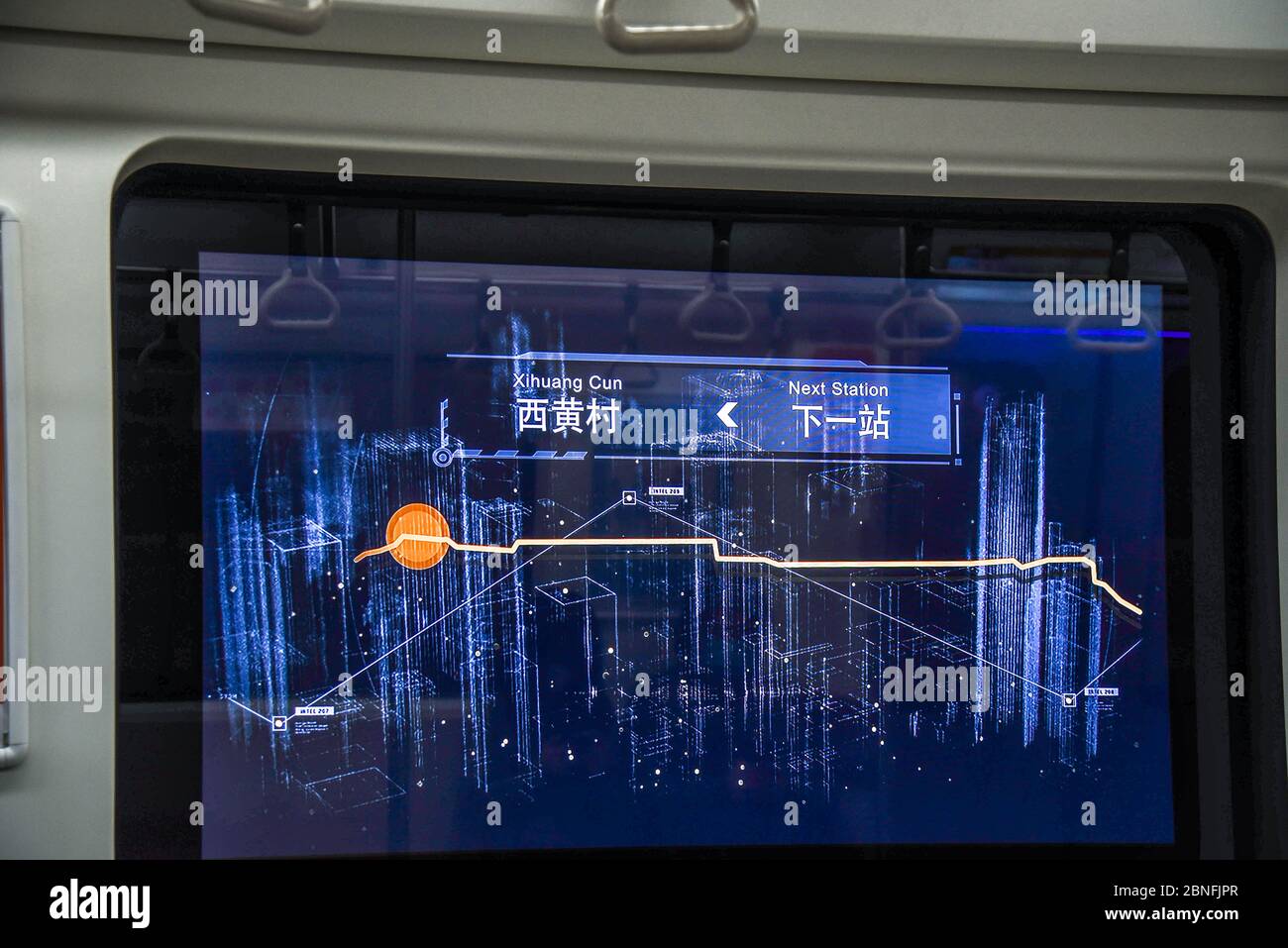 A window at a train of line 6 of Beijing metro system becomes a digital ...