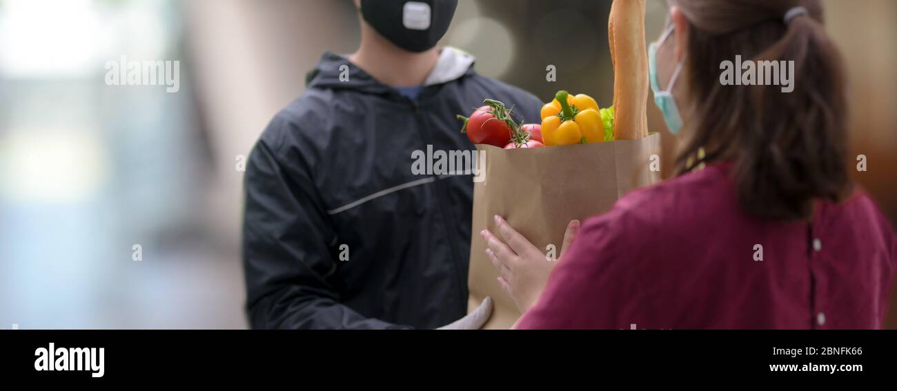 Cropped shot delivery man hi-res stock photography and images - Alamy