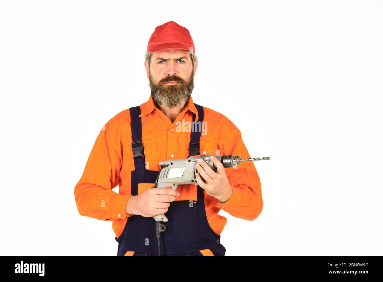 Man drills wall drill hi-res stock photography and images - Alamy