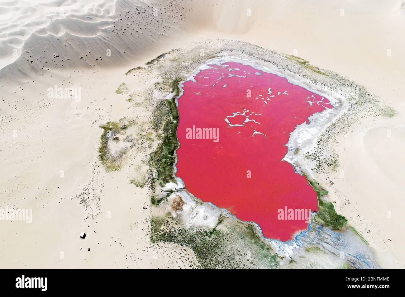 Alxa, China. 14th May, 2020. The beautiful red salt lake Geletu lake in ...