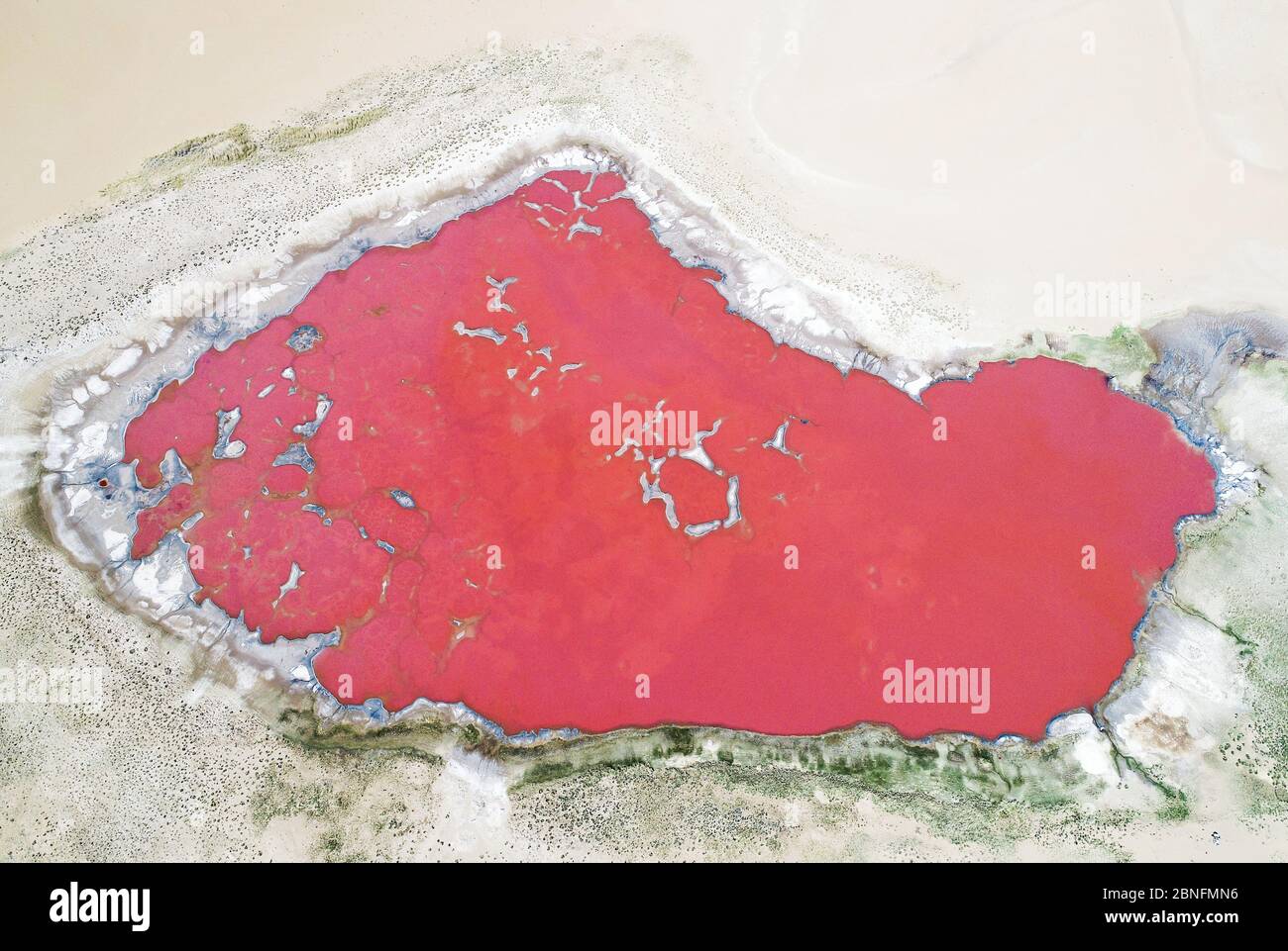 Alxa, China. 14th May, 2020. The beautiful red salt lake Geletu lake in ...