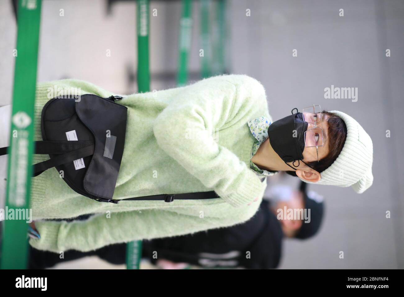 Chinese cross-talk actor Meng Hetang arrives at a Beijing airport ...