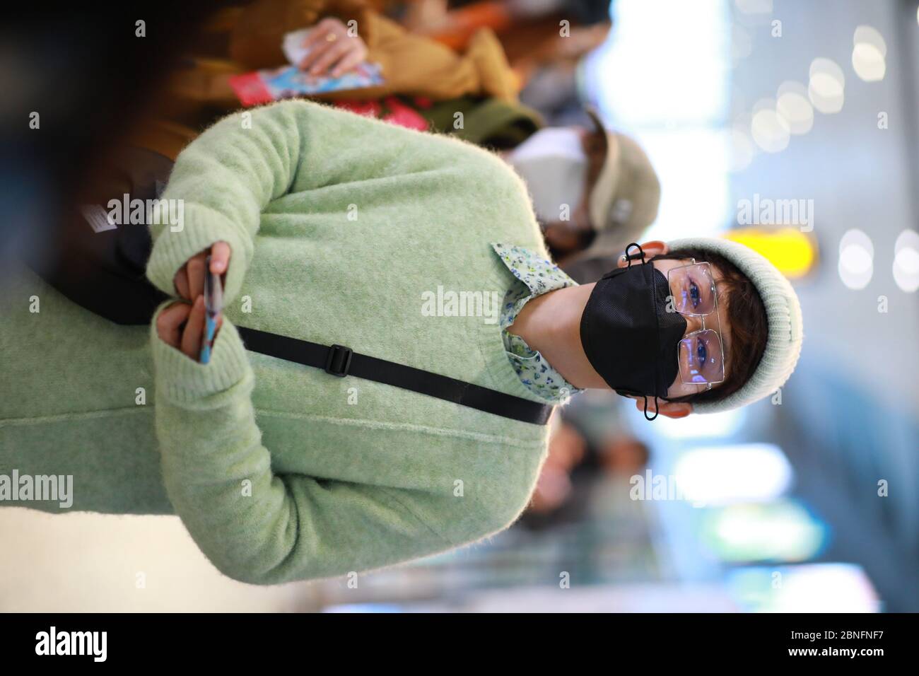 Chinese cross-talk actor Meng Hetang arrives at a Beijing airport ...