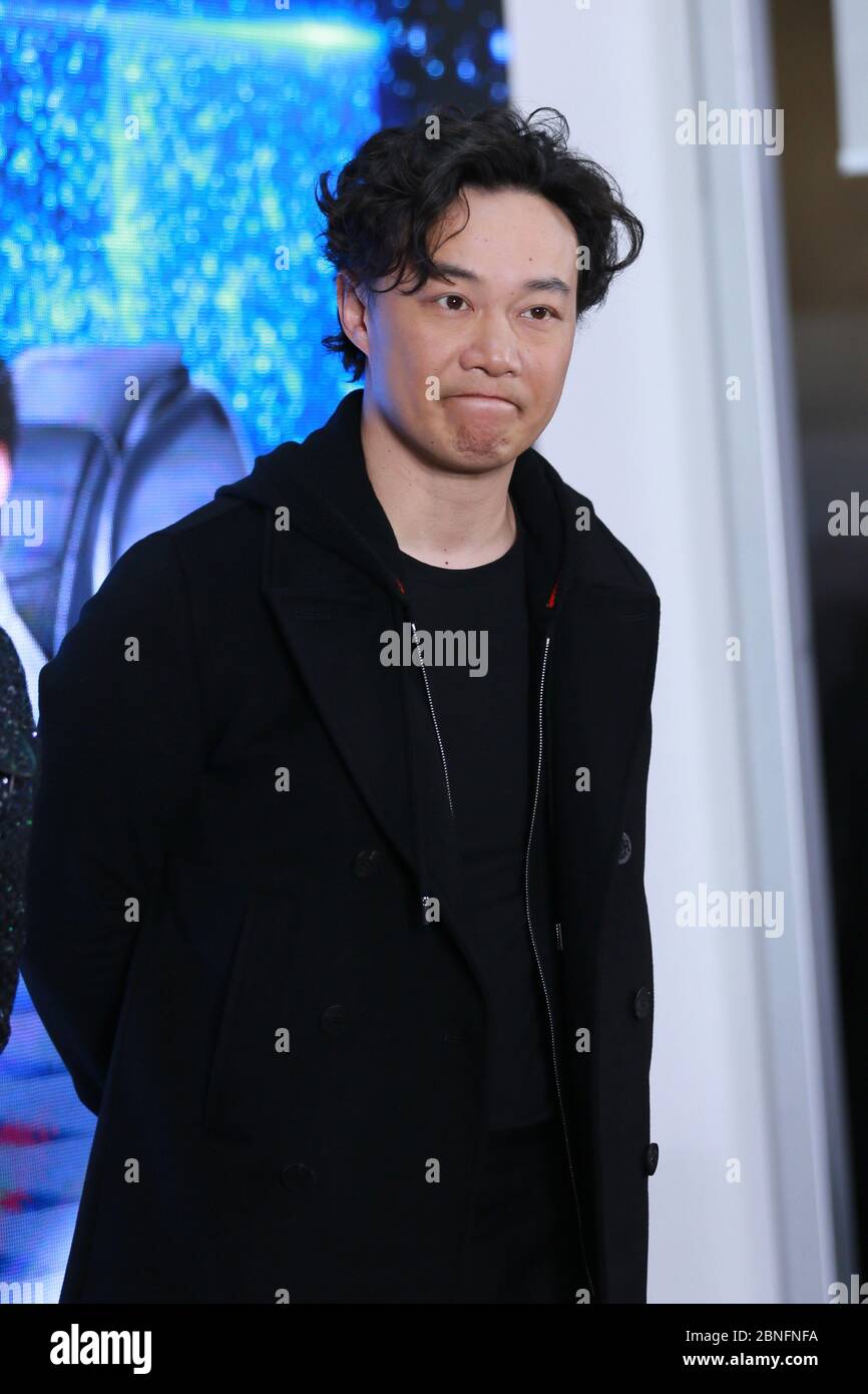 --File--Hong Kong singer and actor Eason Chan stands for a massage ...