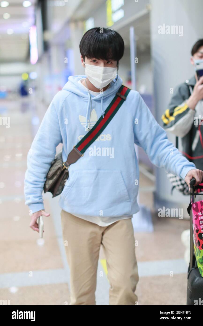 Chinese singer Lin Chaoze arrives at Shanghai airport before departure ...