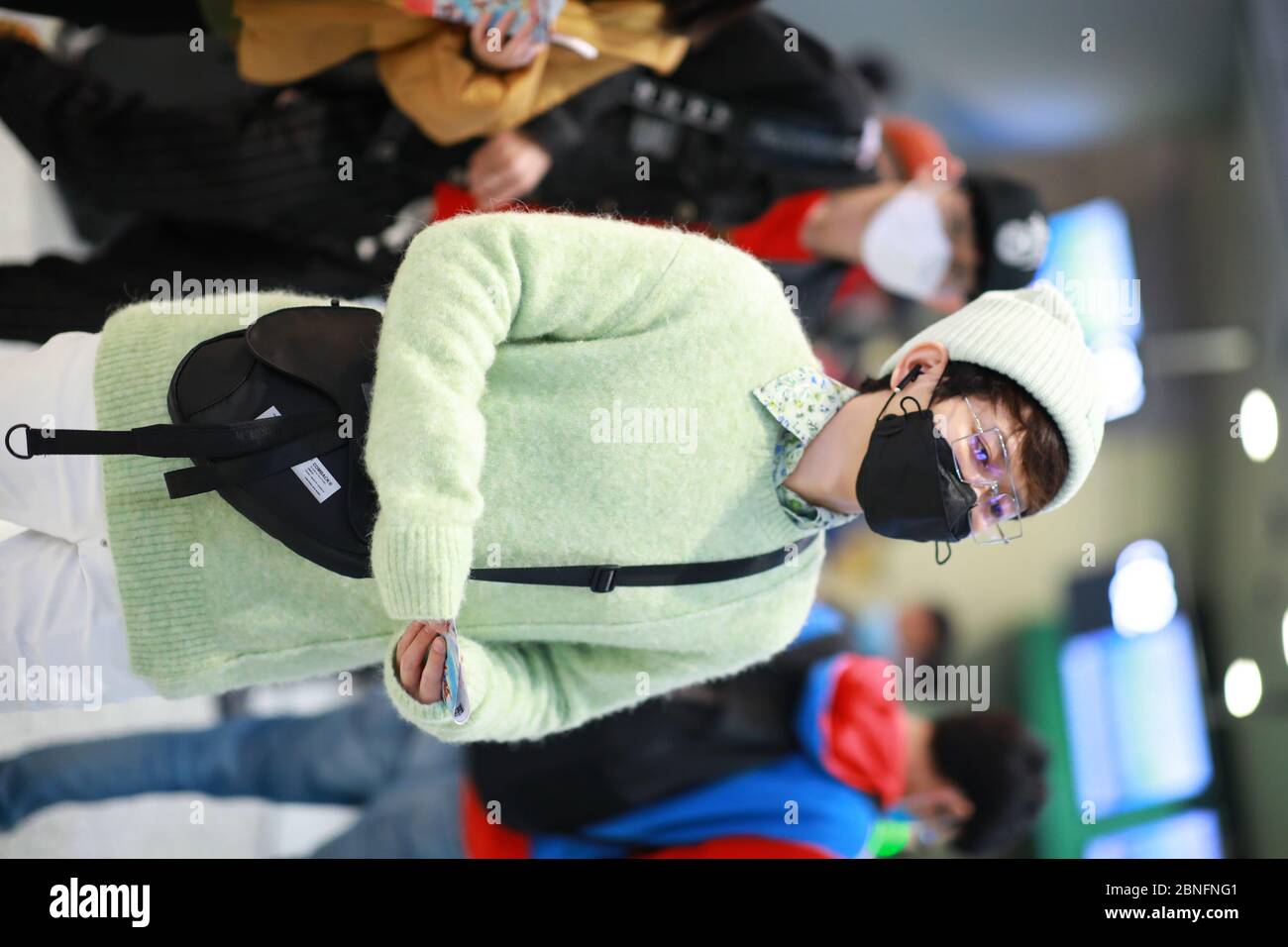 Chinese cross-talk actor Meng Hetang arrives at a Beijing airport ...