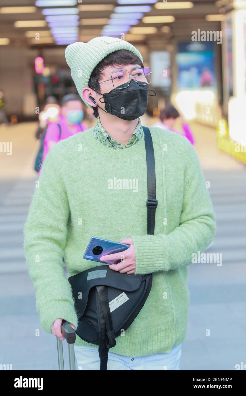 Chinese cross-talk actor Meng Hetang arrives at a Beijing airport ...
