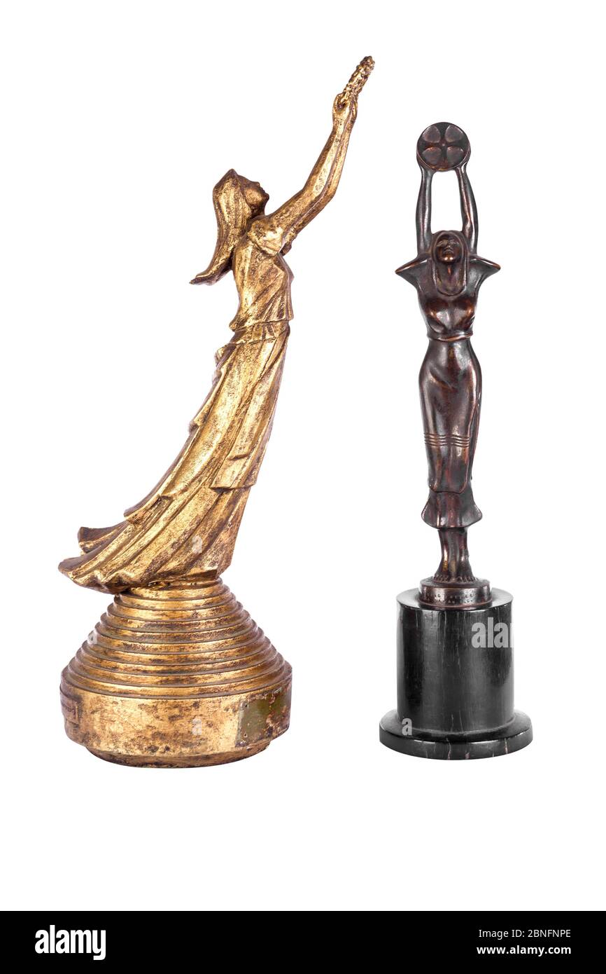 Vertical shot of classical sculptured statues isolated on a white ...