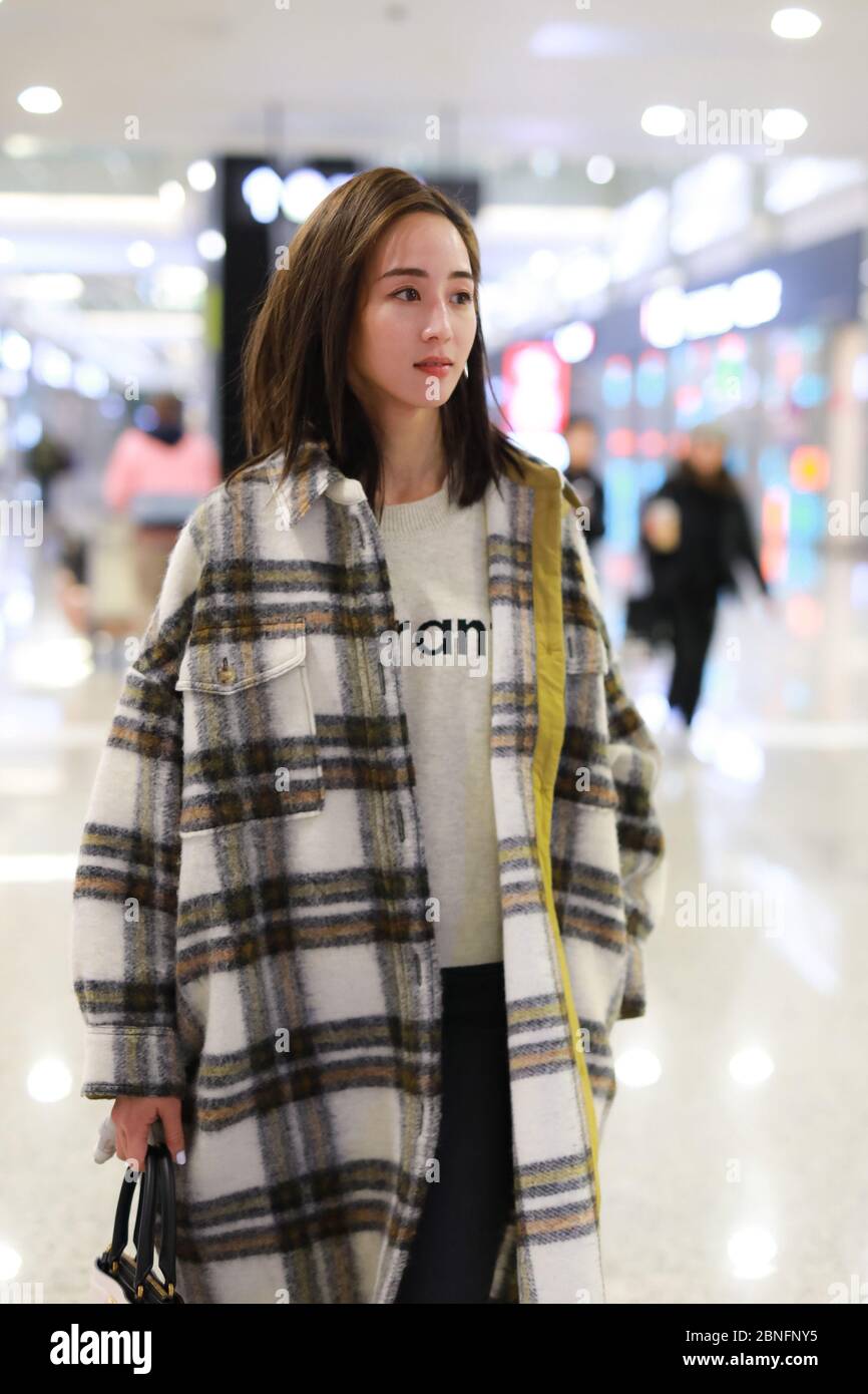 Taiwanese actress Janine Chang arrives at a Shanghai airport before ...
