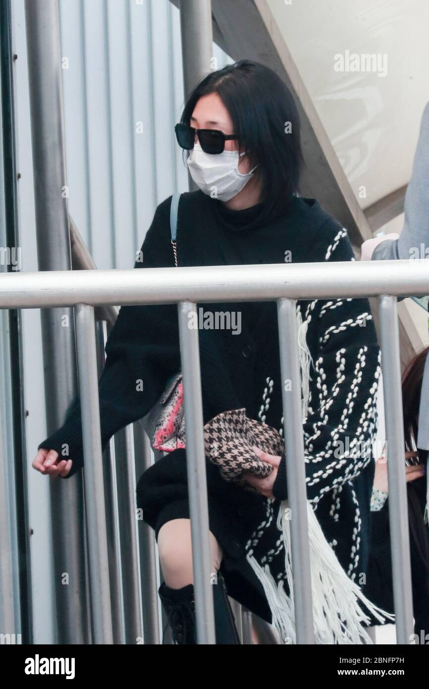 Yamy of Chinese idol girl group Rocket Girls 101 arrives at a Beijing ...