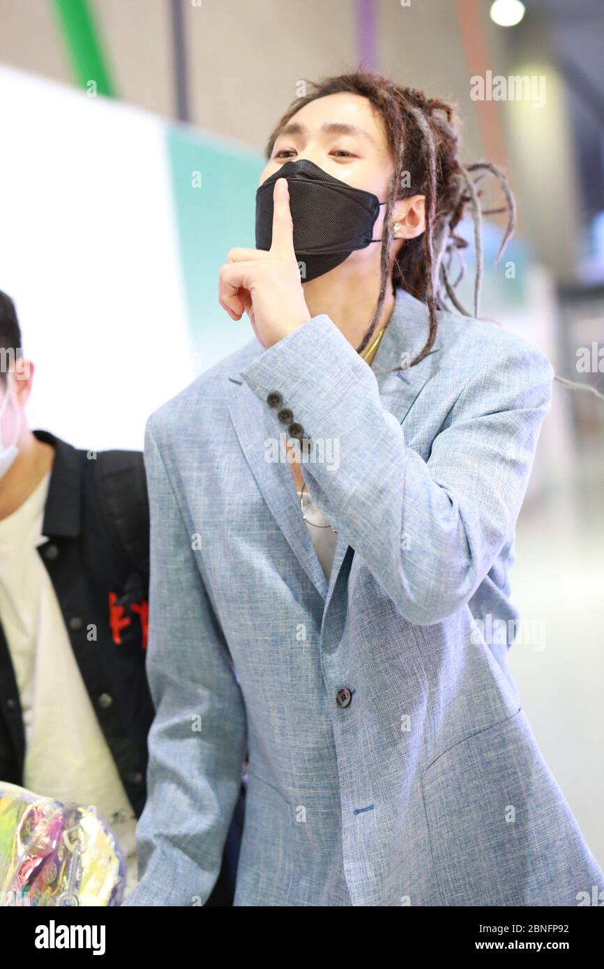 In this unlocated photo, Chinese singer Yue Minghui arrives at an ...