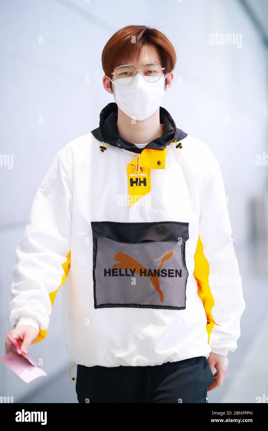 Chinese singer and actor Dong Li arrives at a Shanghai airport before ...