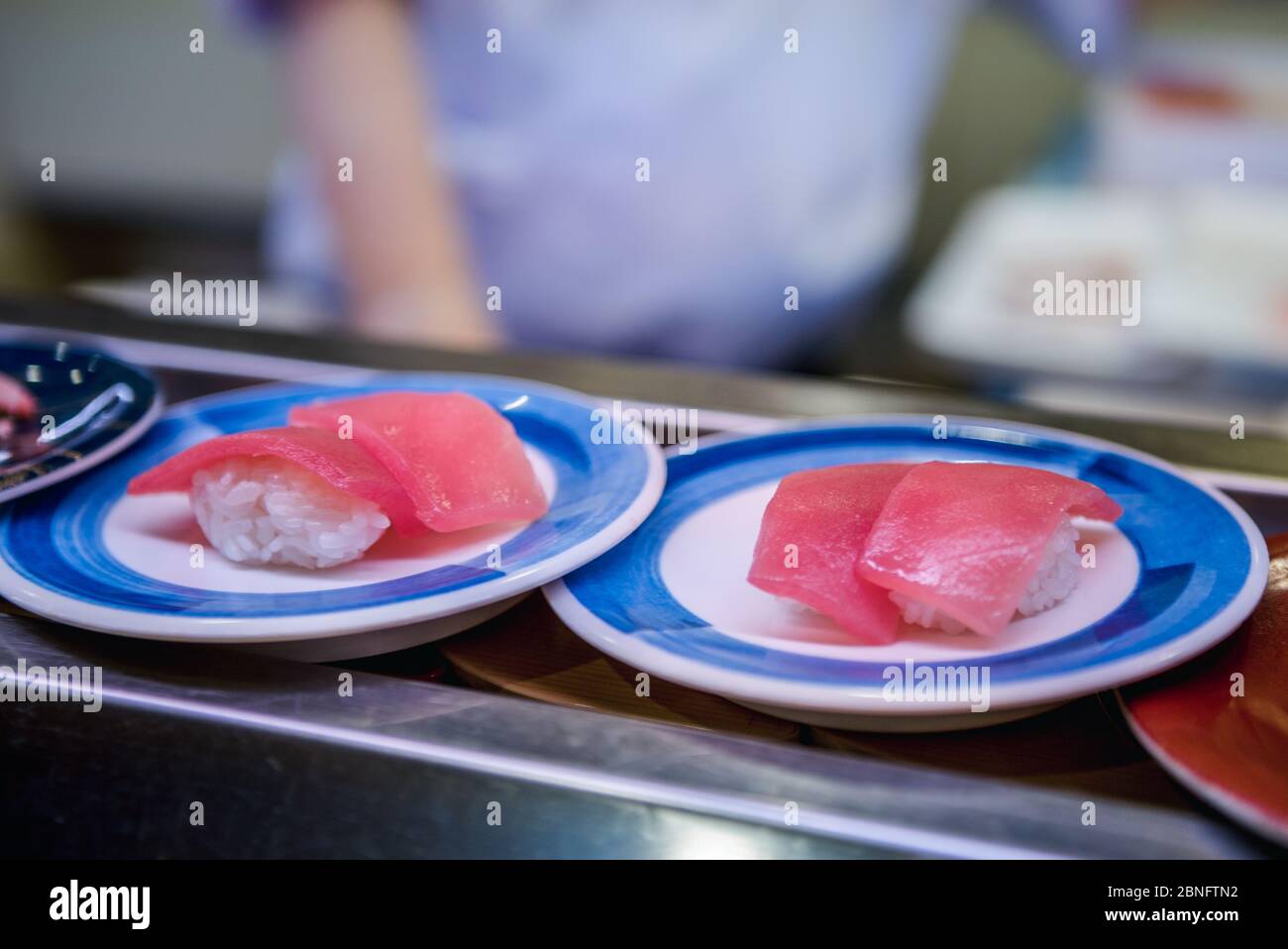 Moving sushi restaurant hi-res stock photography and images - Alamy