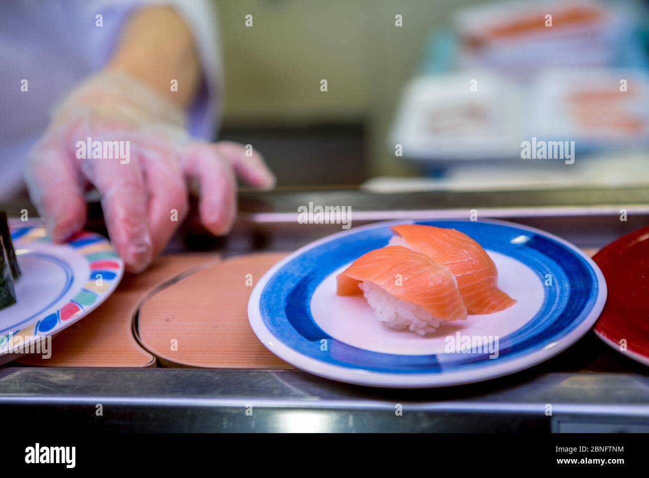 Moving sushi restaurant hi-res stock photography and images - Alamy