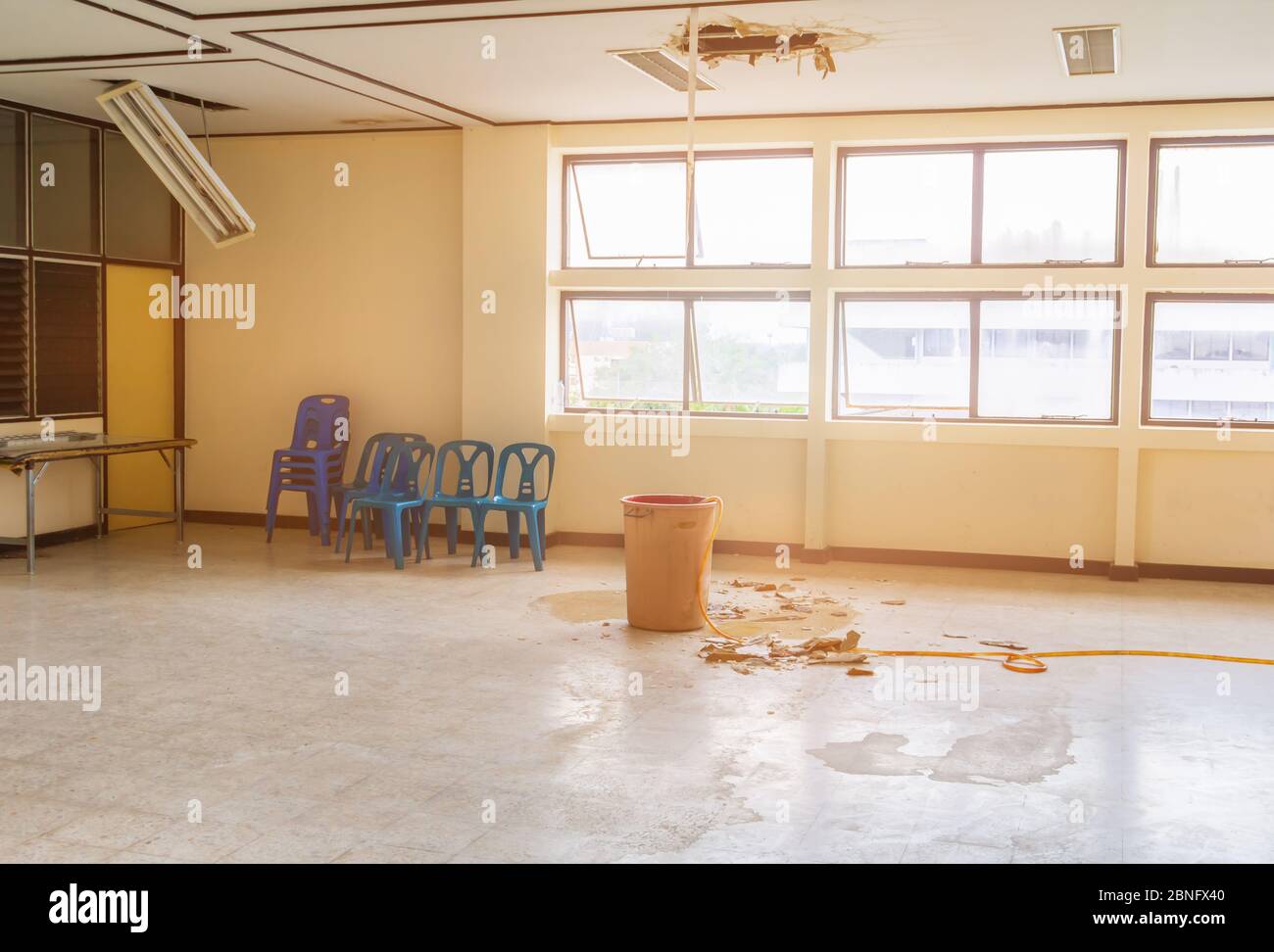 water leak drop in red tank interior office building in from ceiling ...