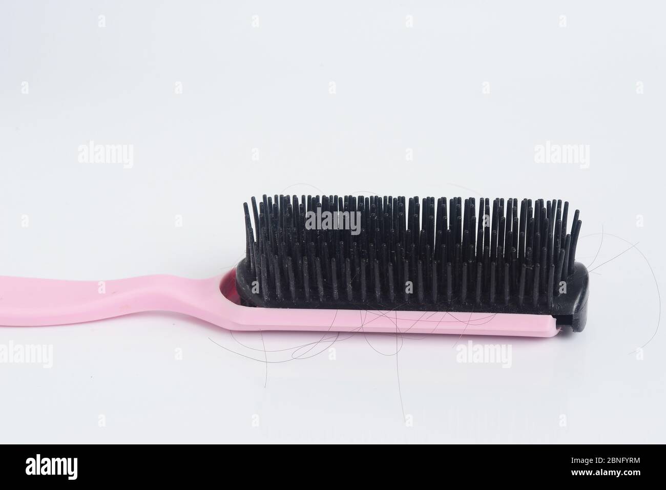 Comb causes hair loss increase breakage Stock Photo - Alamy