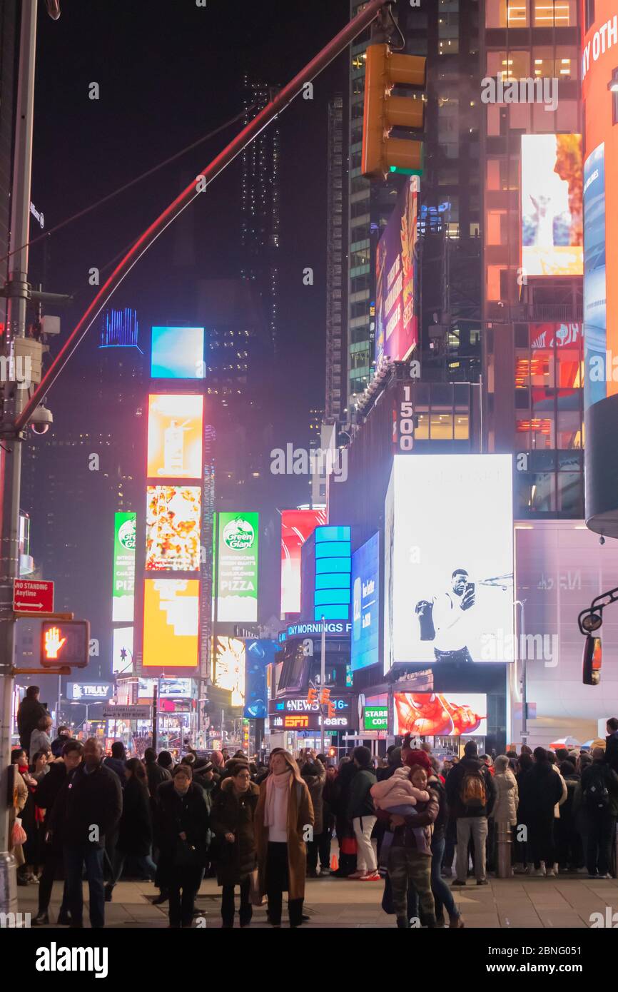 Crowd of people in Times Square in New Yor City at night Stock Photo ...