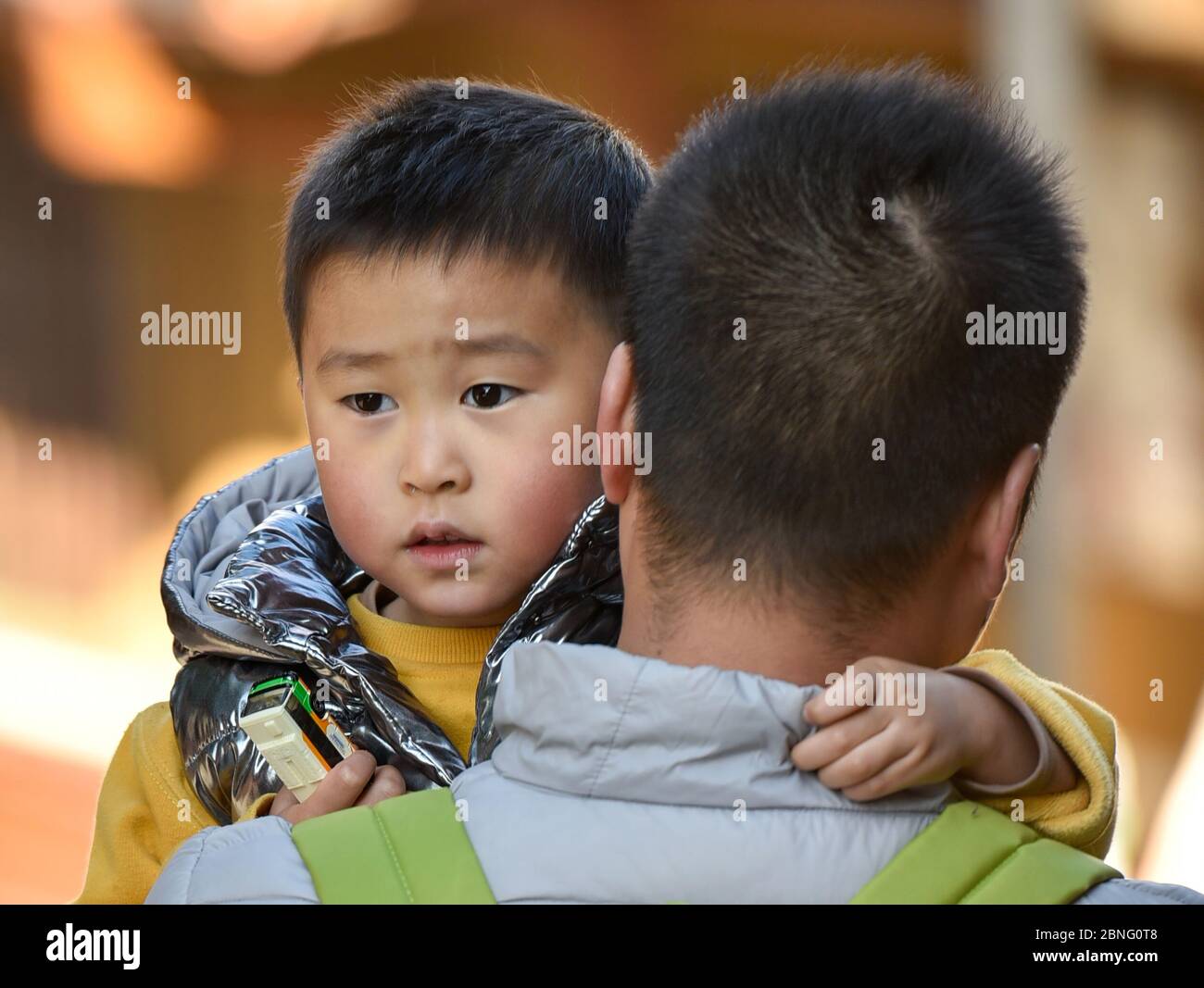 Japanese boy hugging father hi-res stock photography and images - Alamy